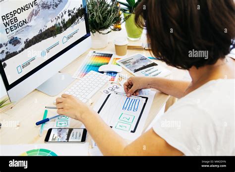 Woman Designing A Responsive Website Stock Photo Alamy