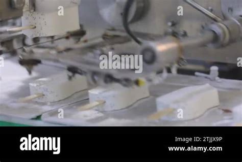 Apparatus For Sorting Ice Cream Ice Cream Dosing Machine On A Conveyor Line Automated Conveyor