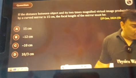 question if the distance between object and its two times magnified virtu