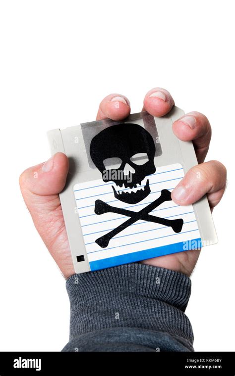 Hand Holding A Infected Computer Floppy Disk Isolated On A White Background Conceptual Image