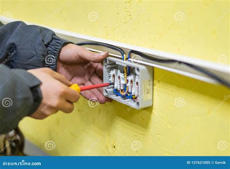 The Process Of Connecting Cables To A Dual Socket Stock Image Image Of Supply Electricians