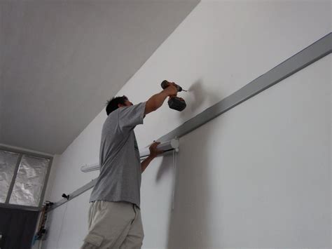 How To Install Projector Screen On Wall Storables