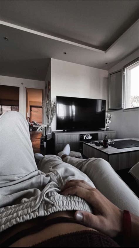 Couple Cuddle In Bed