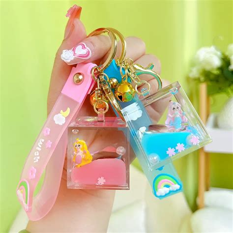 새로운 크리 에이 티브 스퀘어 병 키 체인 여성을위한 귀여운 부동 이동 액체 인어 키 링 소녀 가방 펜던트 키 홀더 선물 Aliexpress