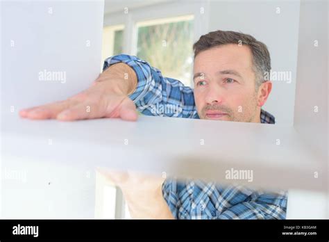 Man Assembling Furniture Stock Photo Alamy