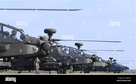 Final Checks Are Carried Out On Five Apache Helicopters On The Flight Line At Wattisham Airfield