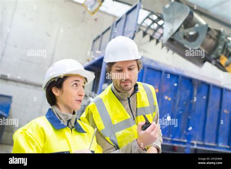 Male And Female Engineers Working In A Power Plant Stock Photo Alamy