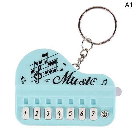 Portable Musical Instrument Toy Piano Keychain Mini Electronic Keyboard Keychain Daraz Pk