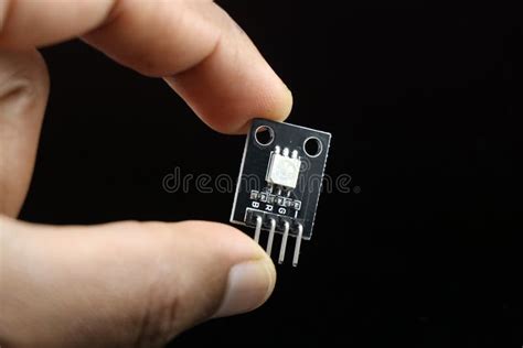 SMD RGB LED Module For Programmable Micro Controller Boards Held In