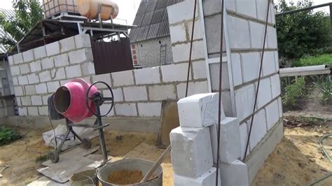 Строительство гаража из пеноблоков с облицовкой част 1 Youtube