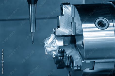 The 4 Axis Simultaneous Machining Center Cutting The Turbine Parts With