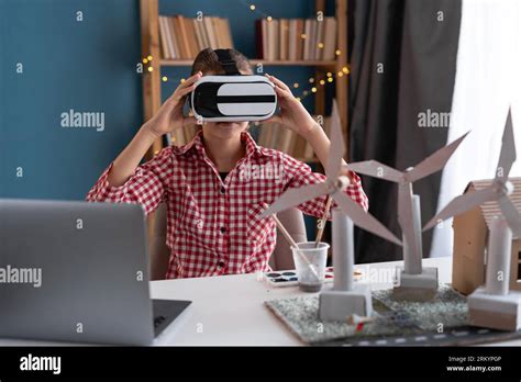 Girl Wearing Augmented Reality Headset Work With 3d Green Building High Tech Home Use Virtual