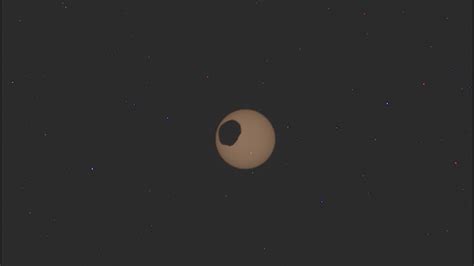 A Martian Solar Eclipse Turns The Sun Into A Giant Googly Eye Popular Science