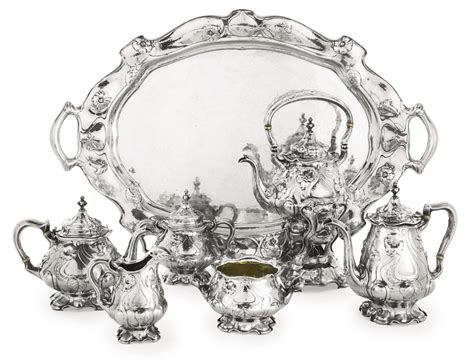 772 An American Silver Six Piece Tea Set With Matching Two Handled