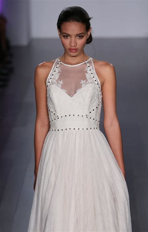 A Model Walks Runway At Hayley Paige Fashion Show During Fall 2015
