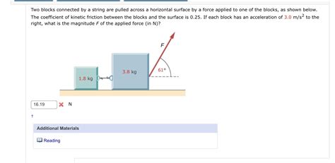 solved two blocks connected by a string are pulled across a