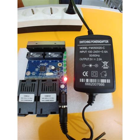 Jual Media Converter 2 Port FO Fiber Optic A B Dan 4 LAN RJ45 100Mbps Plus Adaptor 5V 2A