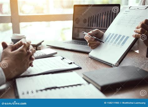 Business Employee Man Are Reporting About Performance Graphs Summary And Financial Budget