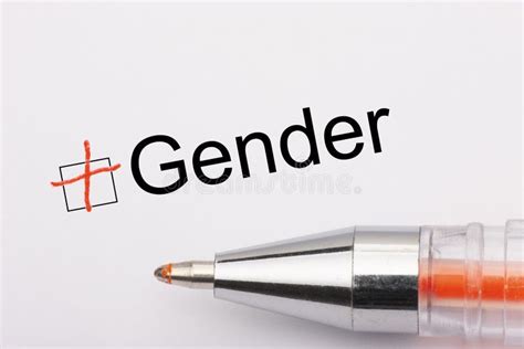 Gender Checkbox With A Tick On White Paper With Metal Pen Checklist Concept Stock Photo