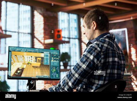 Interior Designer Operating 3d Modeling Application Importing Furniture Elements From Library