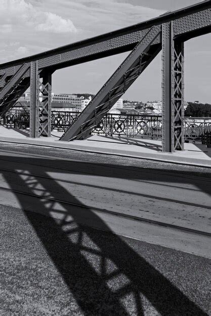 Premium Photo Shadow Of Bridge On Road Against Sky