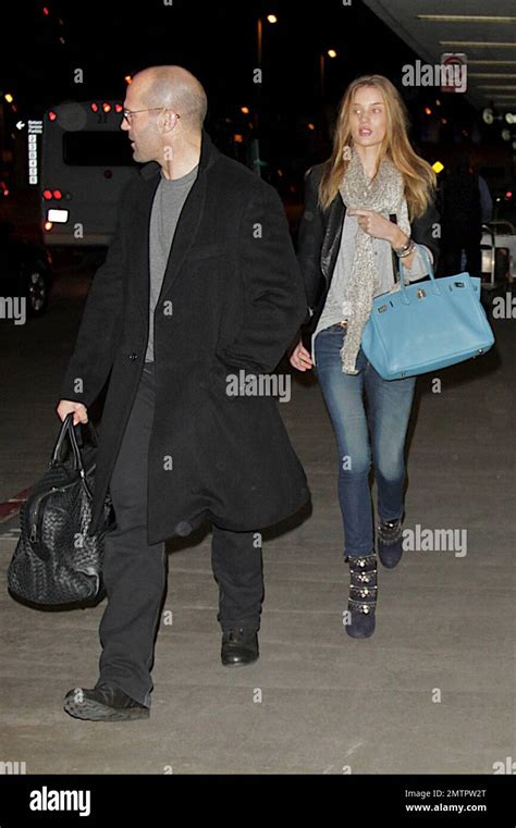 Exclusive Rosie Huntington Whitely And Jason Statham Arrive At Los