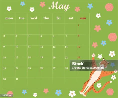 2022년 5월 야생화가 있는 초록색 봄 초원에 누워 있는 귀여운 호랑이를 묘사한 여러 가지 색의 플래너 2022년 5월 달력과 메모를 할 수 있는 장소가 있는 페이지입니다