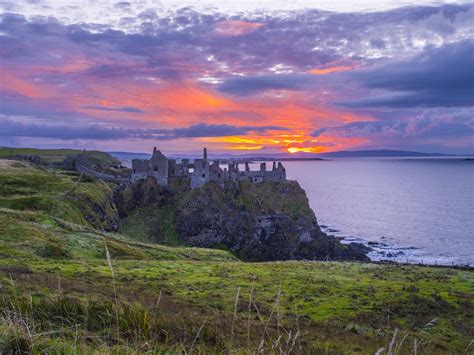 Dunluce Castle Sunset Dramatic Light Beautiful Red Orange Flickr