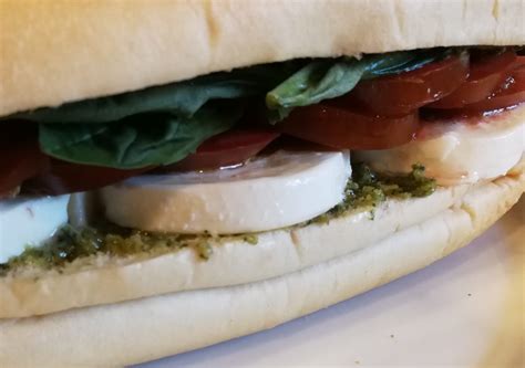 Caprese Tomato Mozzarella Basil Pesto Sandwich A Food Lovers Delight