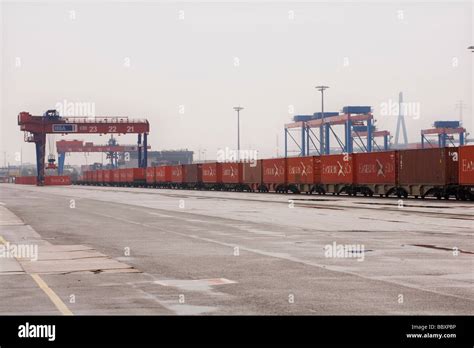 Intermodal Ship To Rail Container Freight On A Port Railway Network Waiting For Transit Stock