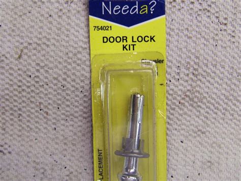 Sell Door Lock Button Chrysler Chrome New Needa In Eugene Oregon