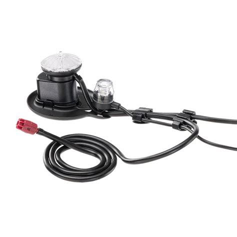 a black and white photo of a car air vent with wires attached to the side