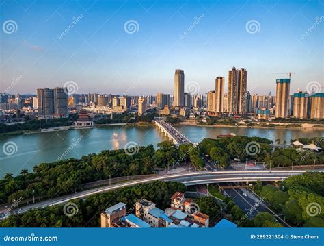 Bridge Across The Yongjiang River And Buildings Along The River Bank In