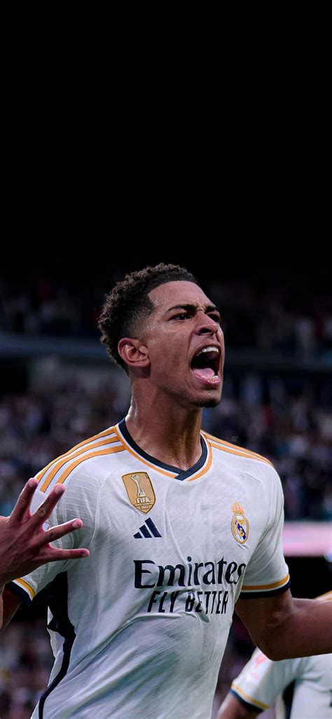 Download Jude Bellingham Celebration Real Madrid Jersey Wallpaper