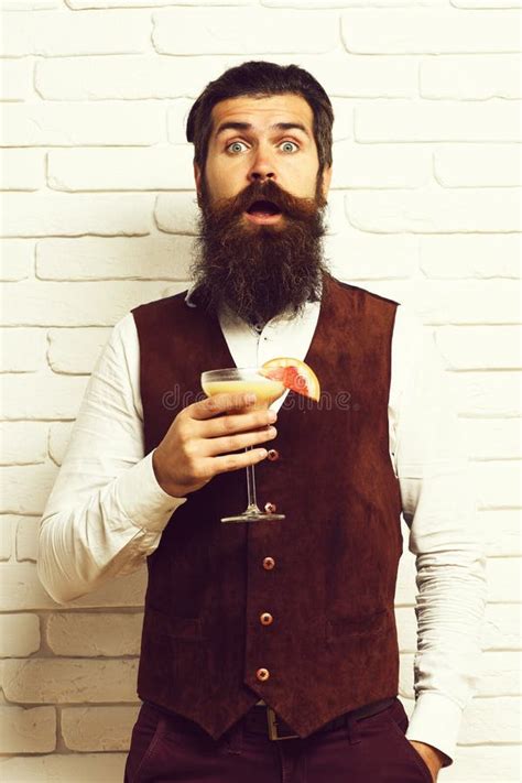 Handsome Bearded Man With Long Beard And Mustache Has Stylish Hair On
