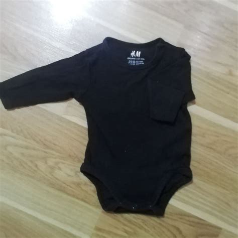 کمدا قیمت و خرید لباس بچگانه رنگ مشکی