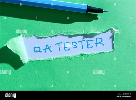 Sign Displaying Qa Tester Word Written On Quality Assurance Of An On