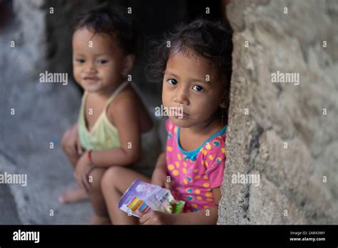 Two Young Girls Within A Poor Slum Area Of Cebu Cityphilippines Stock