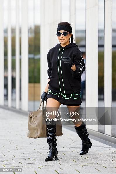 Influencer Salome Chaboki Wearing A Black Hoodie By Mondenero Eu A