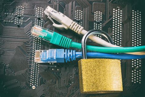 Network Ethernet Cables In Padlock On Computer Motherboard Internet
