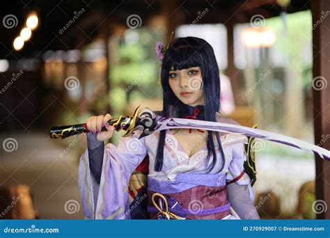 Portrait Of A Beautiful Young Woman Game Cosplay With Samurai Dress