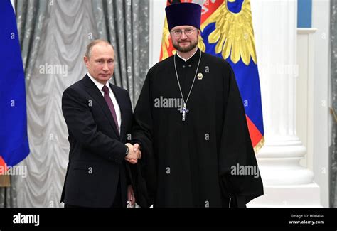 Russian President Vladimir Putin Presents Orthodox Arch Priest