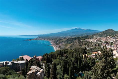 Taormina Coast Panorama With Mount Etna Volcano In Sicily Italy Stock
