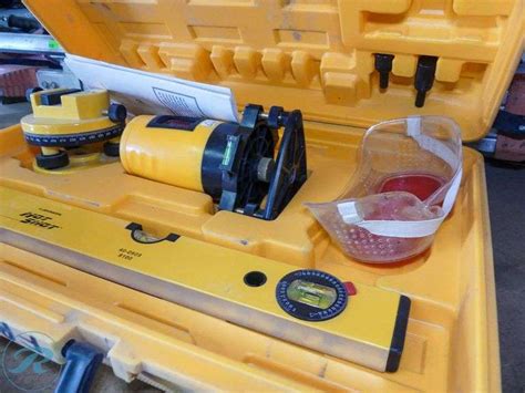 Johnson Laser Level Kit And Stand Roller Auctions