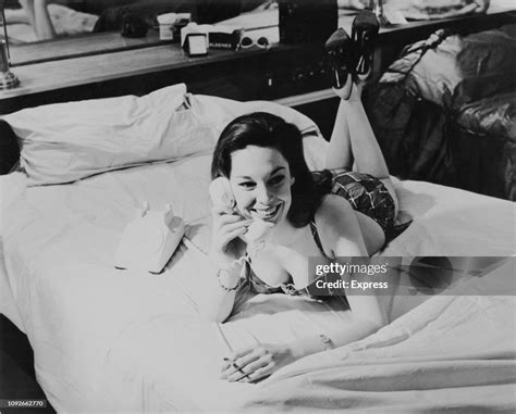 English Actress Tracy Reed Answers The Telephone In Her Underwear In