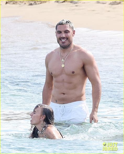 Chrishell Stause And Spouse G Flip Hit The Beach With Shirtless Chris