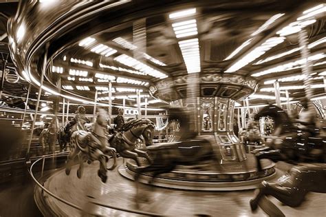 Premium Photo A Blurry Image Of People Riding A Carousel With A