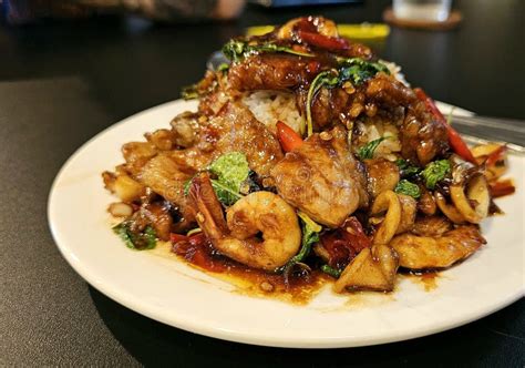 Pad Kra Pao Thai Food Spicy Stir Fried Seafood With Basil And Rice