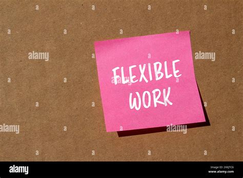 Flexible Work Message Written On Pink Paper With Cardboard Background Conceptual Flexible Work