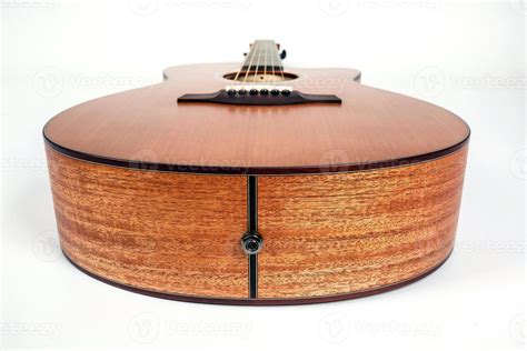 Wood Texture Of Lower Deck Of Six Strings Acoustic Guitar On White